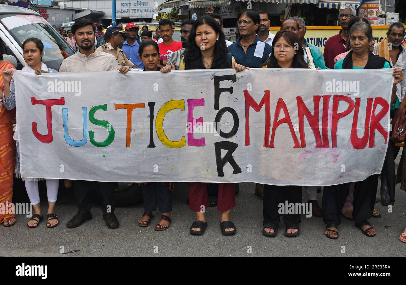 Mumbai, India. 24th July, 2023. Protesters hold a banner during a ...