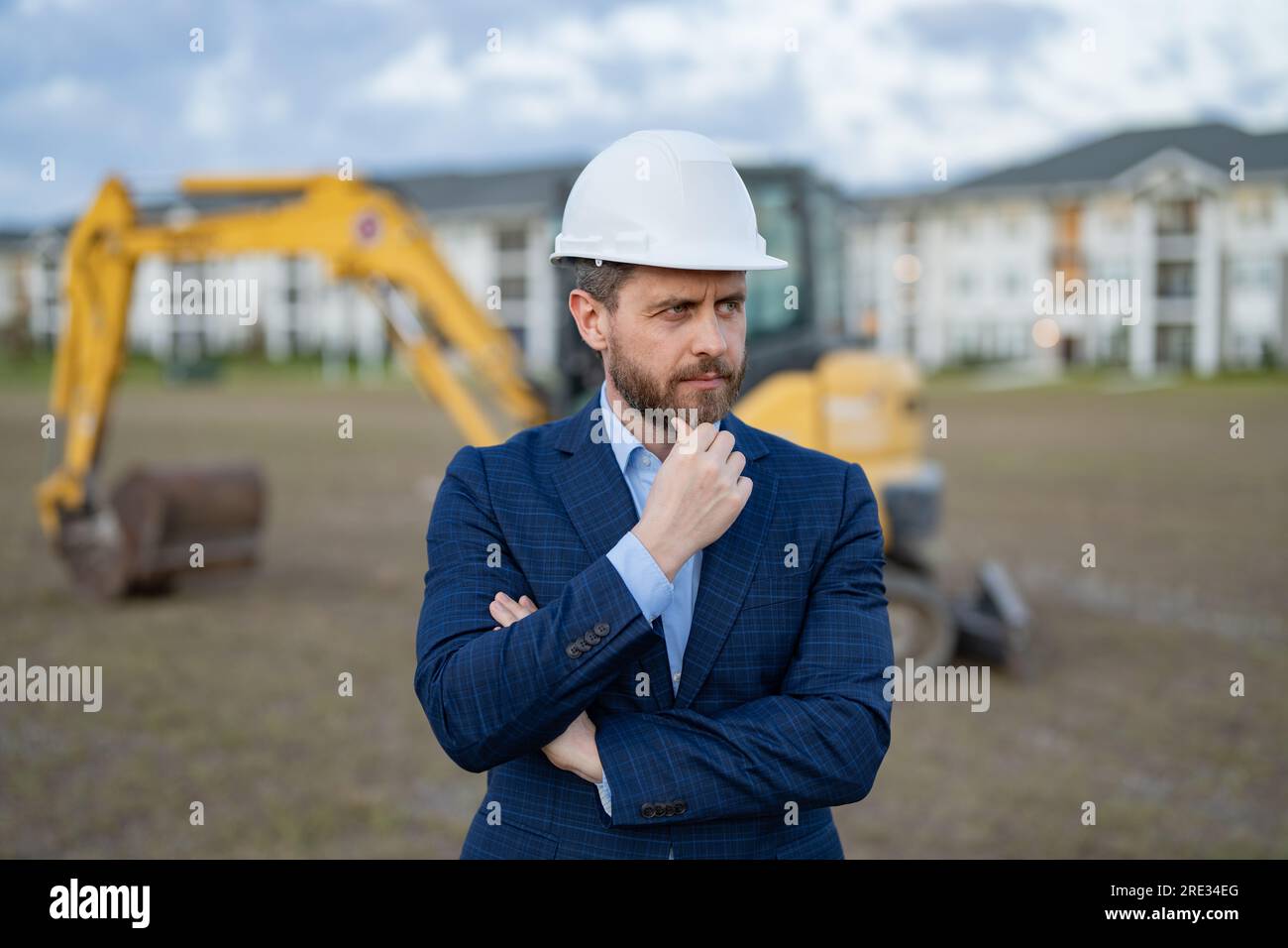 image of civil engineering supervisor wearing hardhat. civil ...
