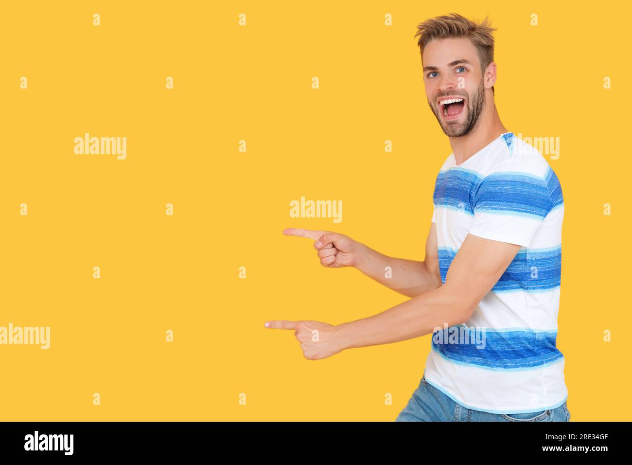 man offering take advantage of summer sale, copy space. man looks ...