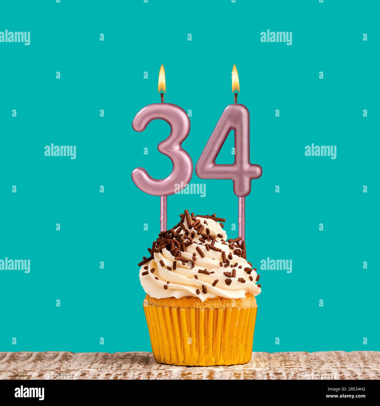 Birthday card with number 34 candle on aquamarine background Stock ...