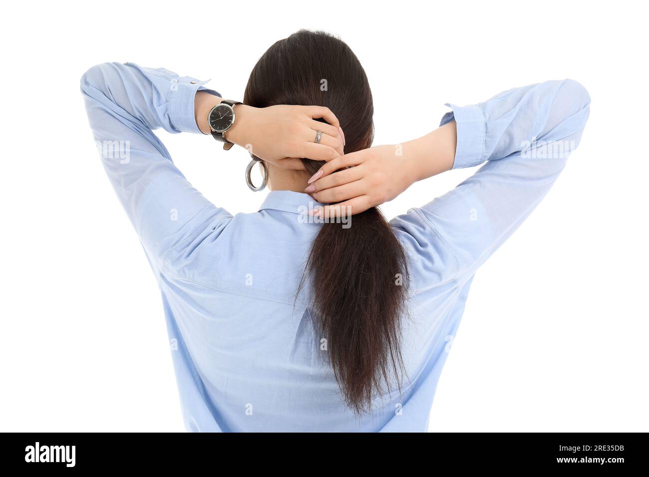 Young woman with wristwatch isolated on white background, back view ...
