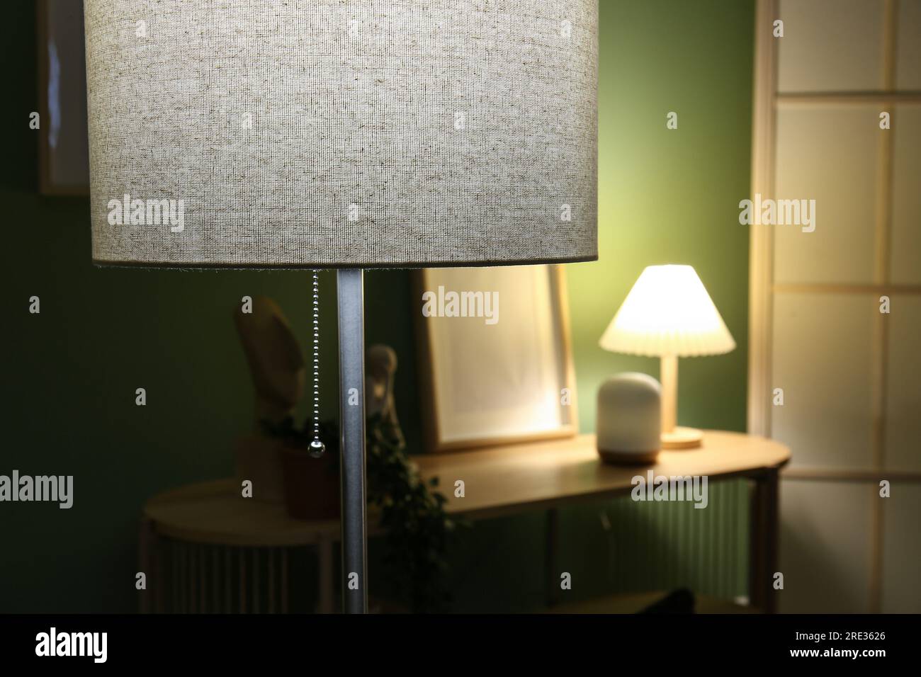 Lit lamp in dark room hi-res stock photography and images - Alamy