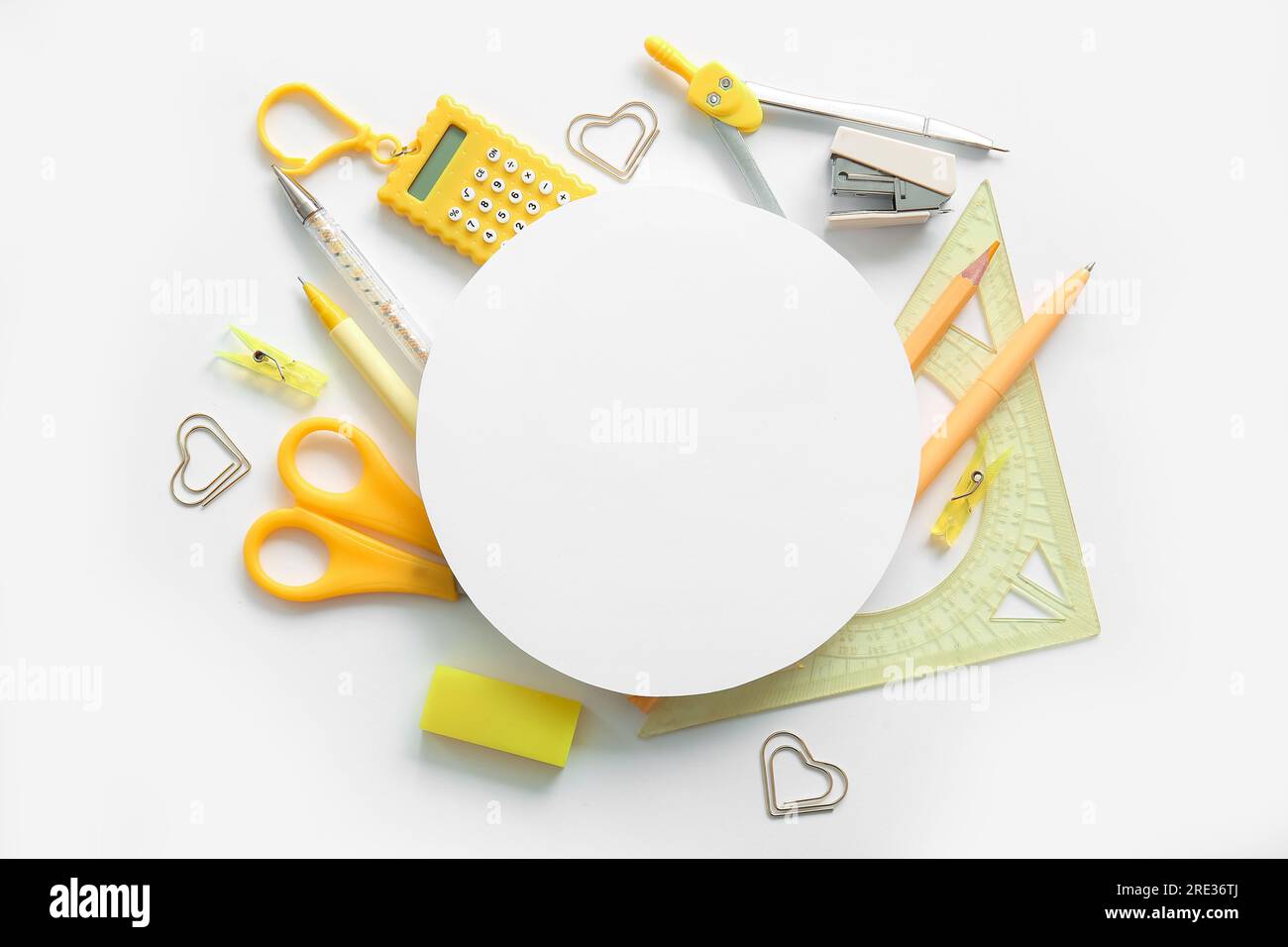 Composition with blank paper sheet and different school stationery on ...