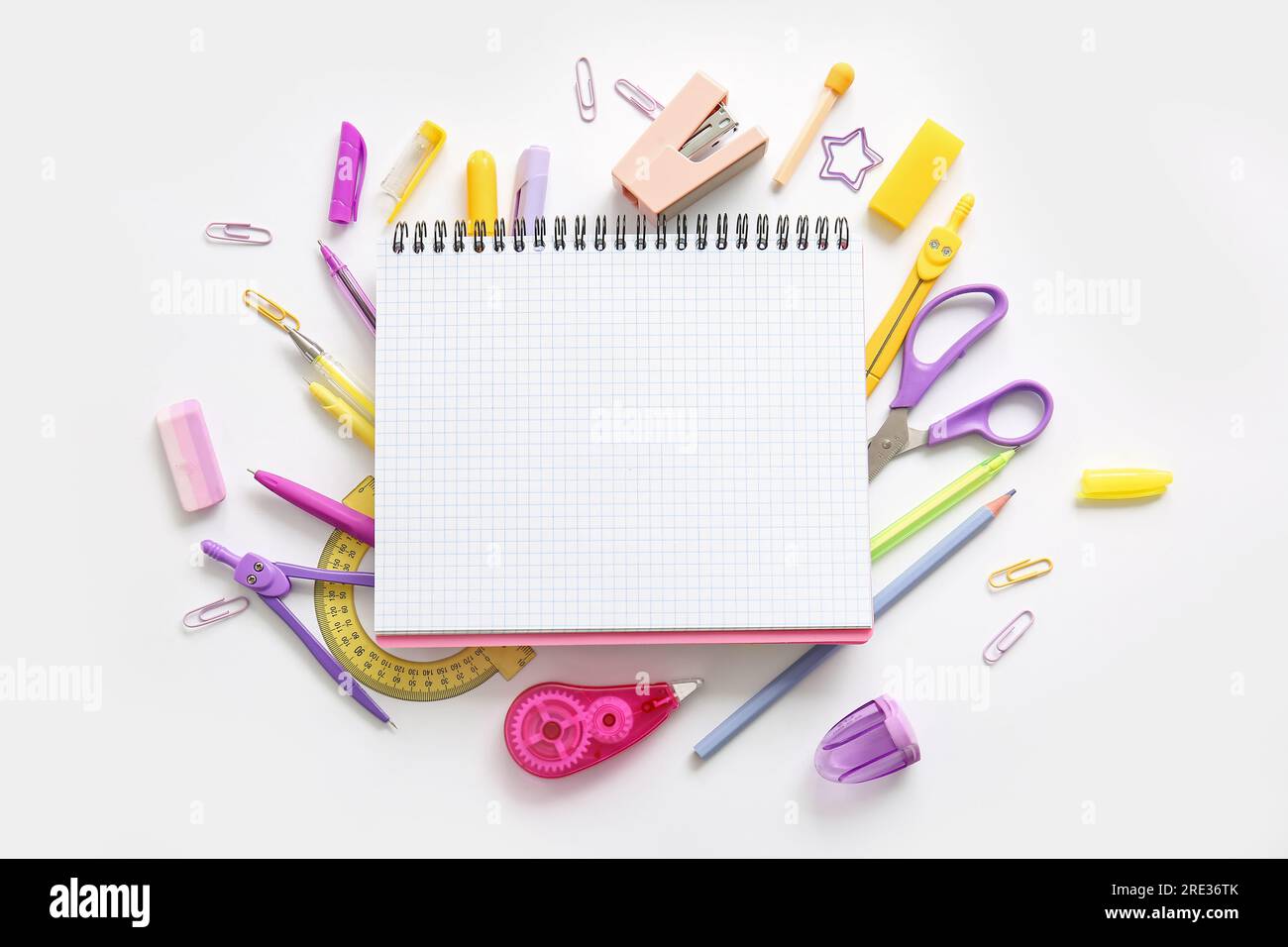 Composition with blank notebook and different school stationery on ...