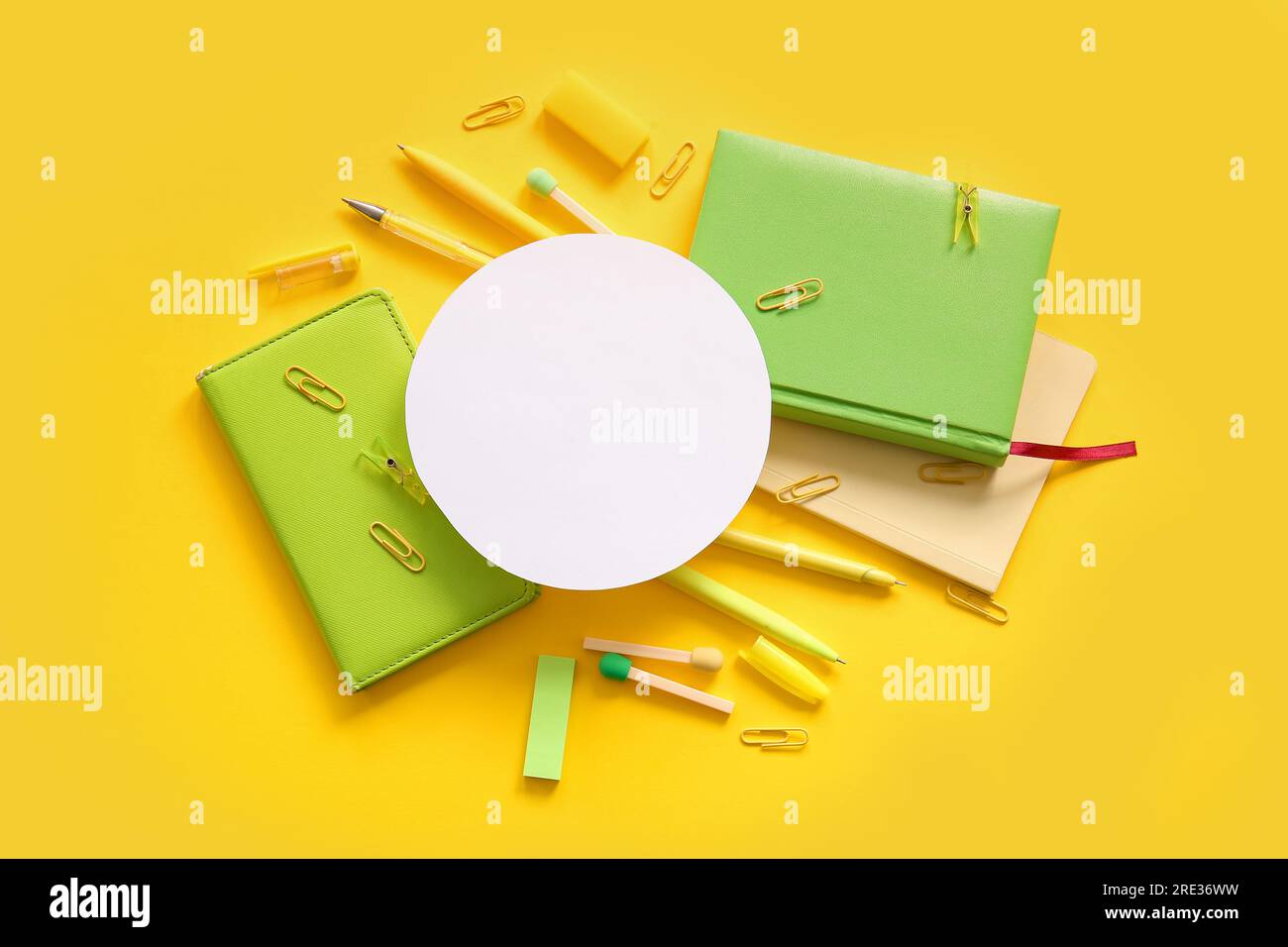 Composition with blank paper sheet and different school stationery on ...