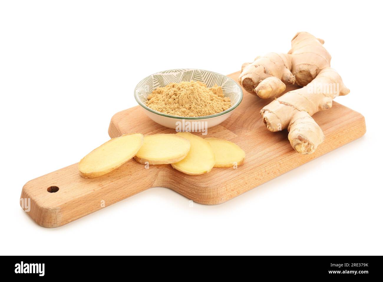 Wooden board with fresh ginger root and bowl of dried powder on white ...