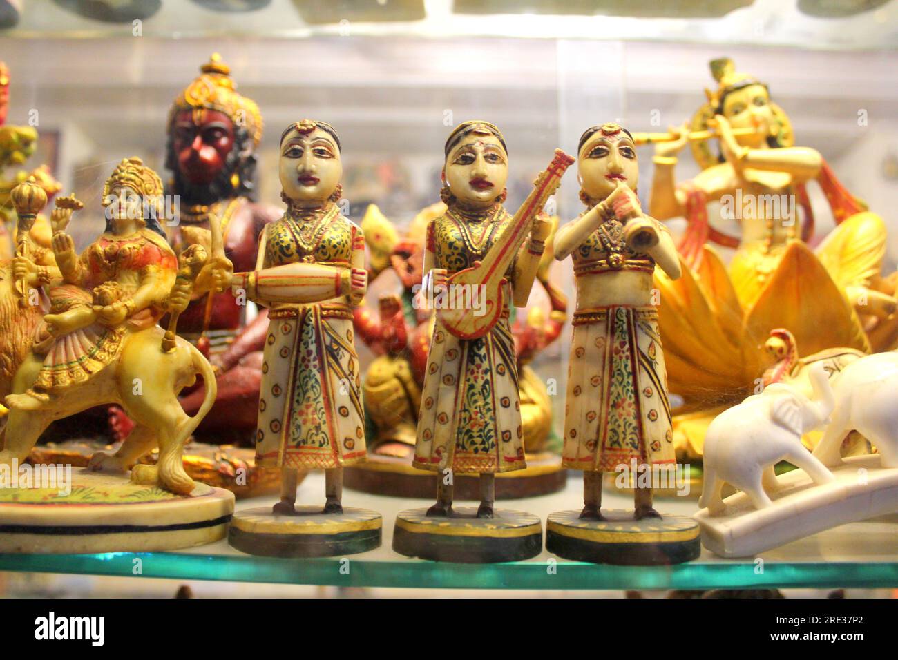 Indian marble dolls playing indian instruments. Hand painted handicraft ...