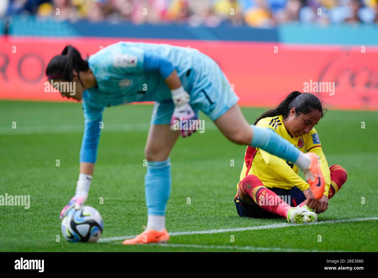 Colombia's Mayra Ramirez, on the pitch, fixes her shoe during the Women ...