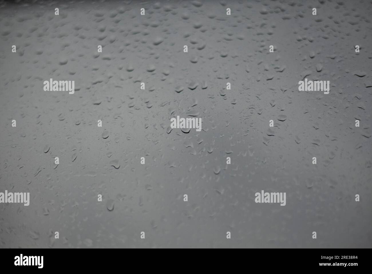 Rain drops on glass. Wet glass. Rain outside. Bad weather. Background ...