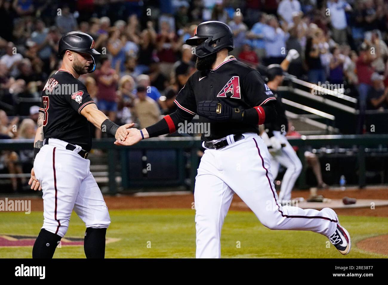 Arizona Diamondbacks' Christian Walker, left, and Emmanuel Rivera ...