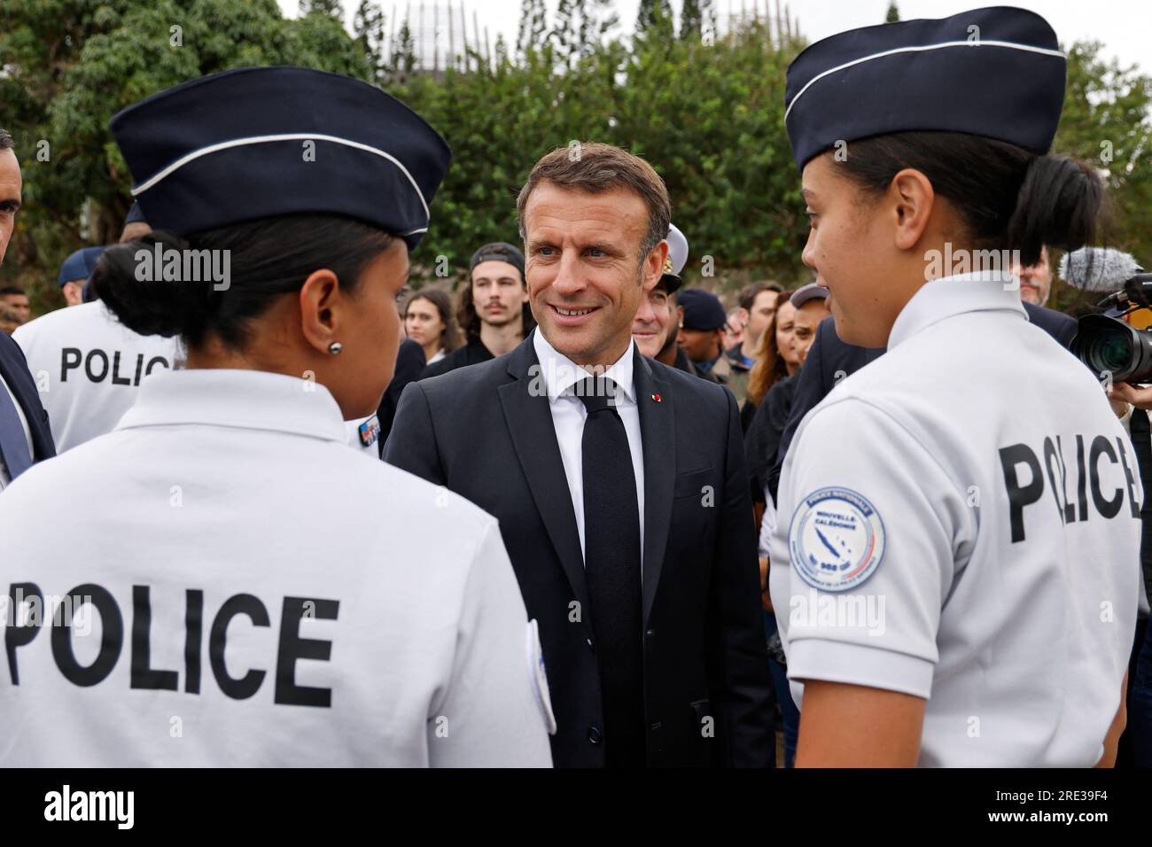 Noumea, France. 25th July, 2023. French President Emmanuel Macron (C ...