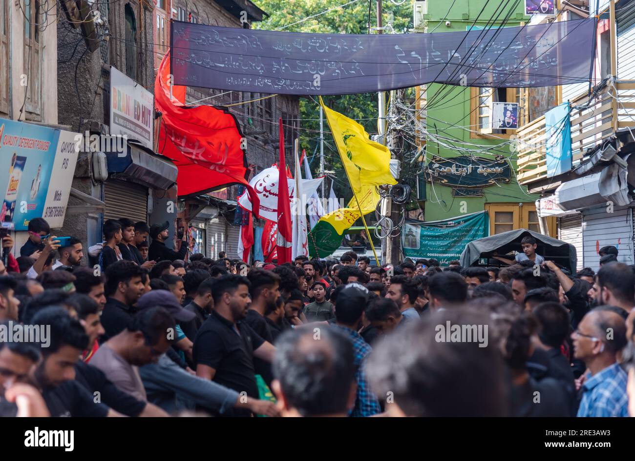 Srinagar, India. 24th July, 2023. Shia Muslims beat their chest as they ...