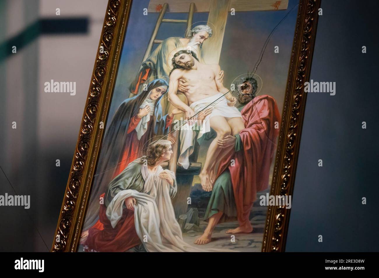 An Orthodox icon damaged by a fragment of a Russian shell in one of the ...