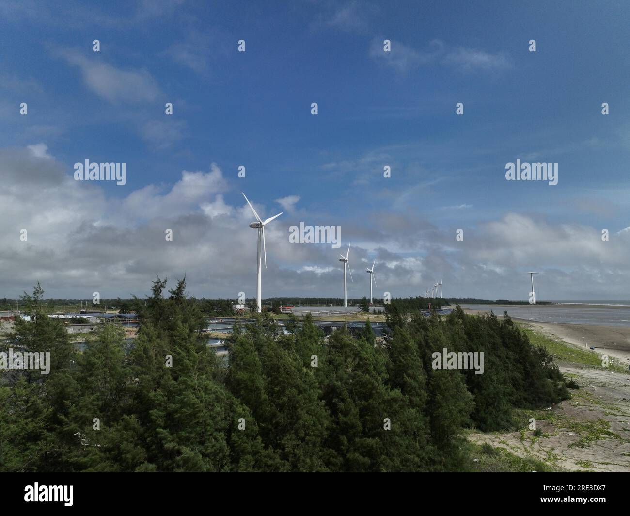 Aerial photo shows the wind power farm project under construction in Xinliao Township, Xuwen ...