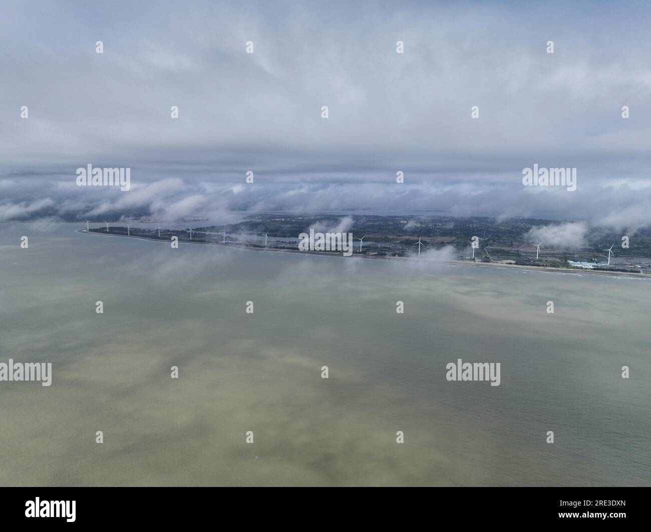 Aerial photo shows the wind power farm project under construction in Xinliao Township, Xuwen ...