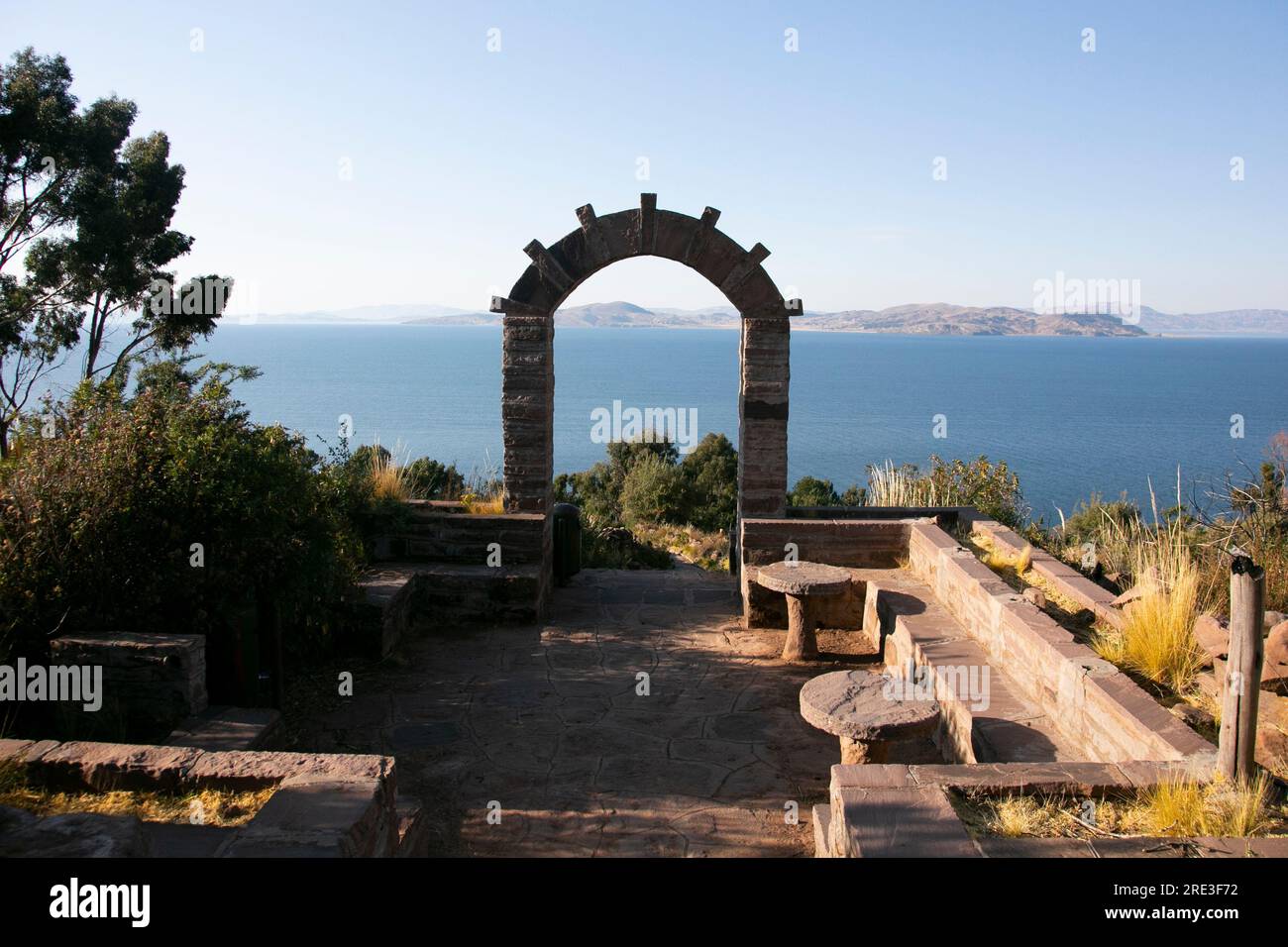 Traditional stone arch of the Llachon peninsula, in the Lake Titicaca ...