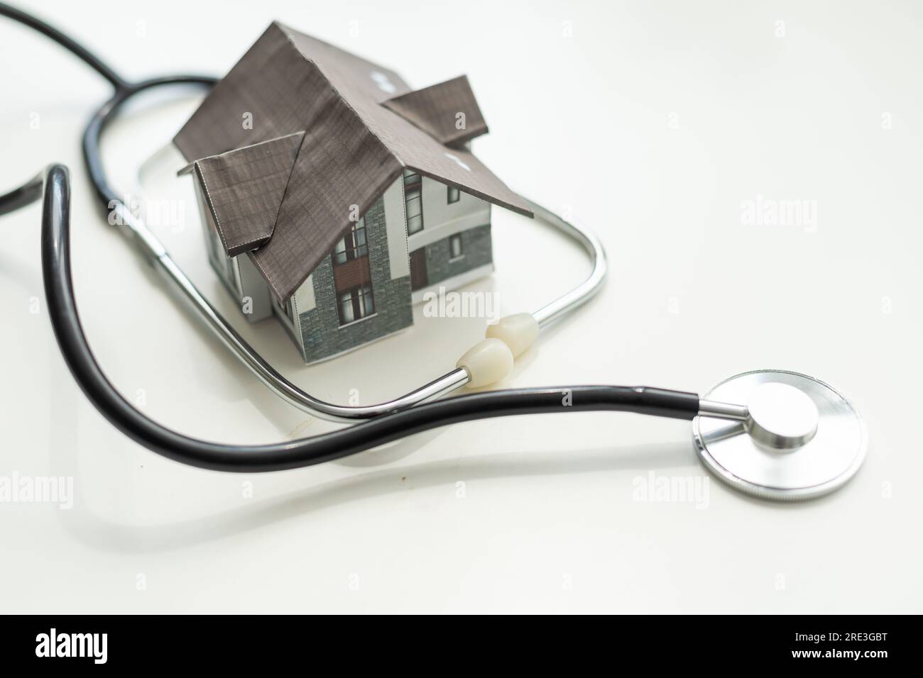 House check. miniature house and stethoscope Stock Photo - Alamy