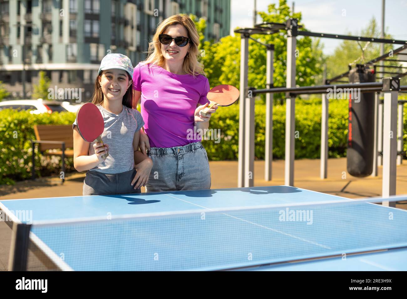 Family Playing Table Tennis