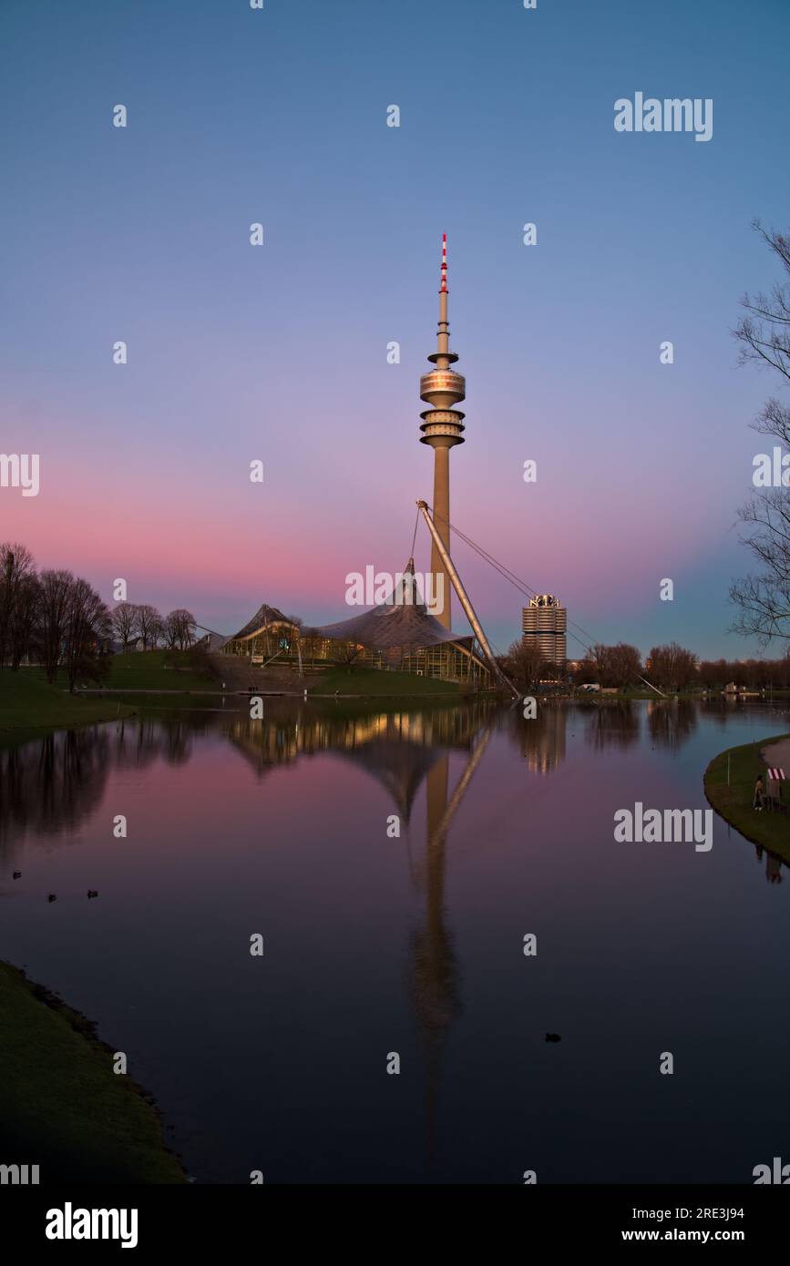 Olimpiatower (Olimpiaturm) and Olimpiasea after the sunset. Olympiapark ...