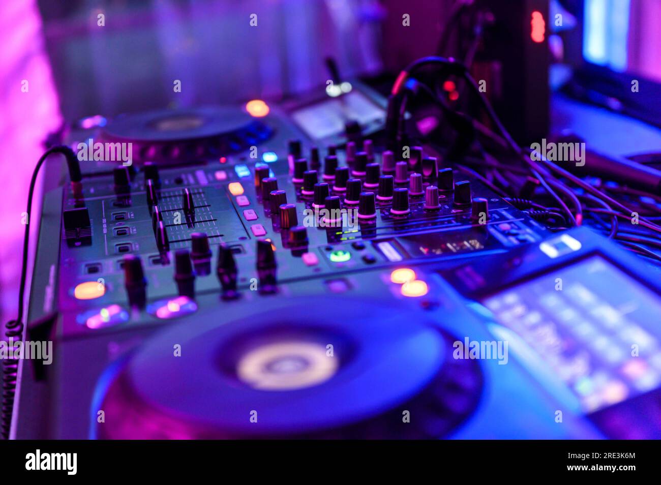 Professional DJ Equipment sound and audio mixer control panel with ...