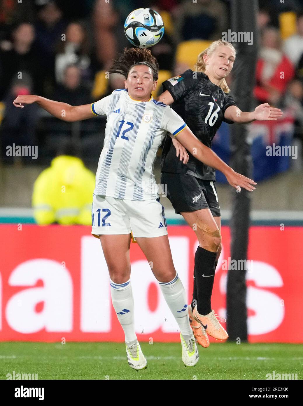 Philippines' Ryley Bugay, left, and New Zealand's Jacqui Hand compete ...