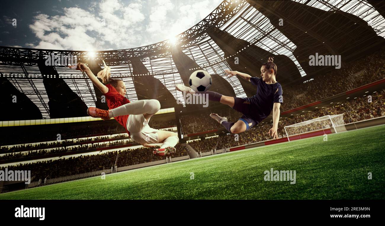 Professional female football players in motion during tense game ...
