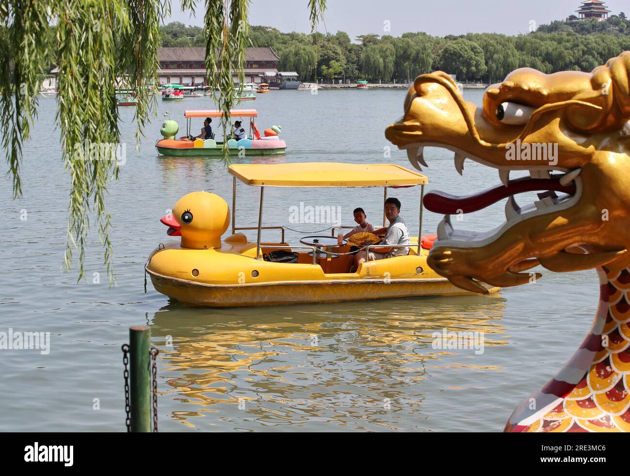 Tourists visit Beihai Park by boat in Beijing, China, 23 July, 2023 ...