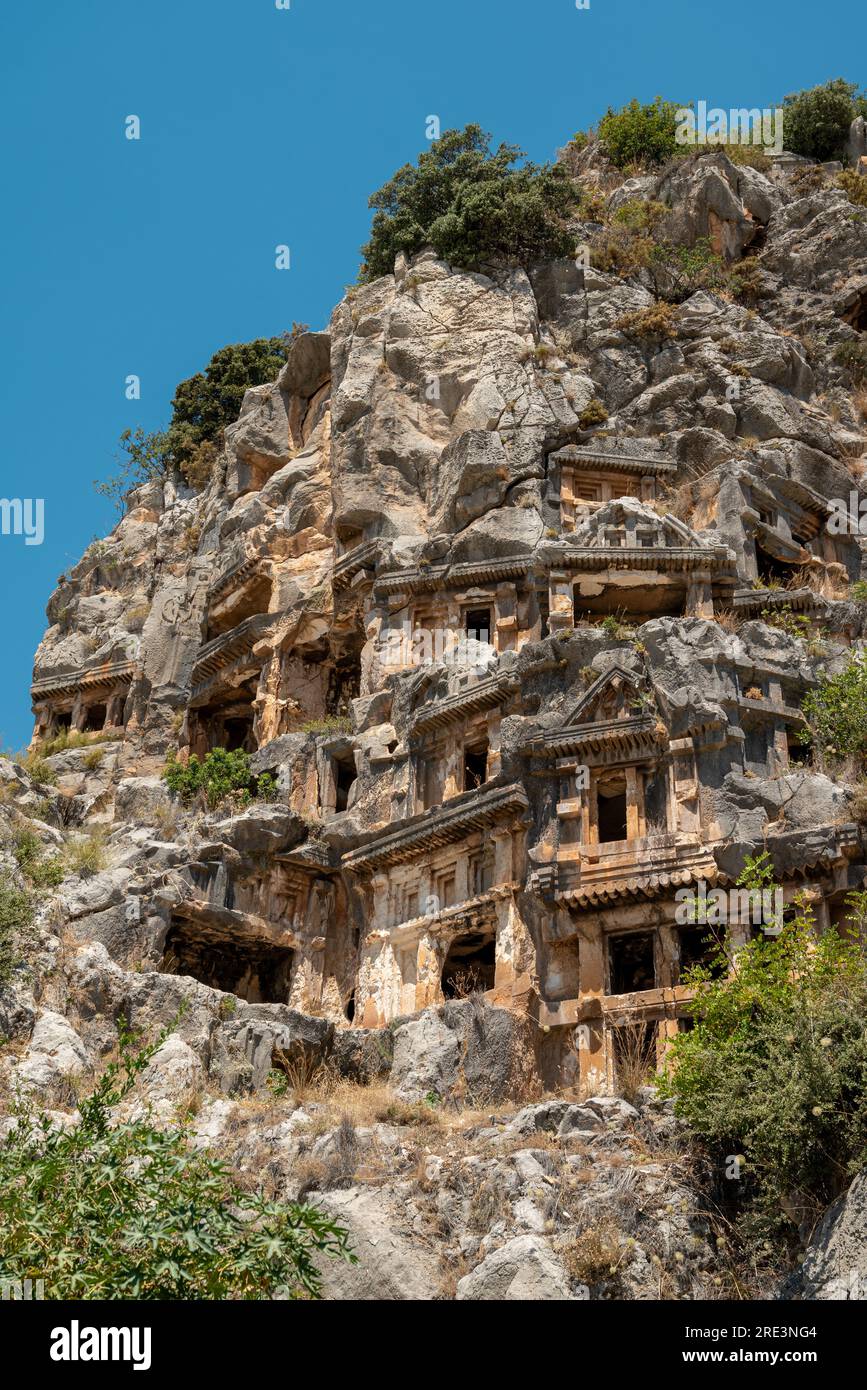 The ruins of the amphitheater and ancient rock tombs in the ancient ...