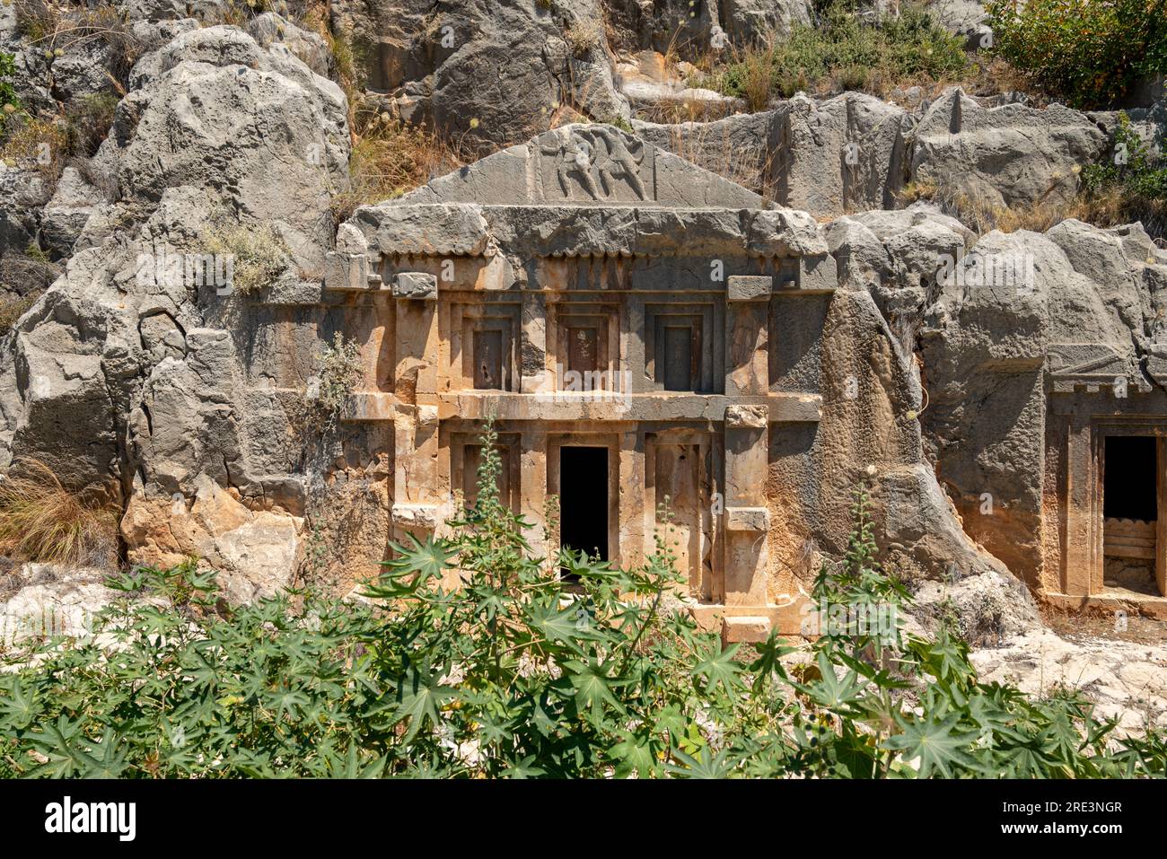 The ruins of the amphitheater and ancient rock tombs in the ancient ...