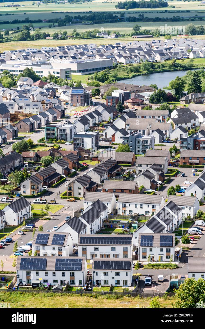 Elevated view of housing with solar panels on the Raploch Estate ...