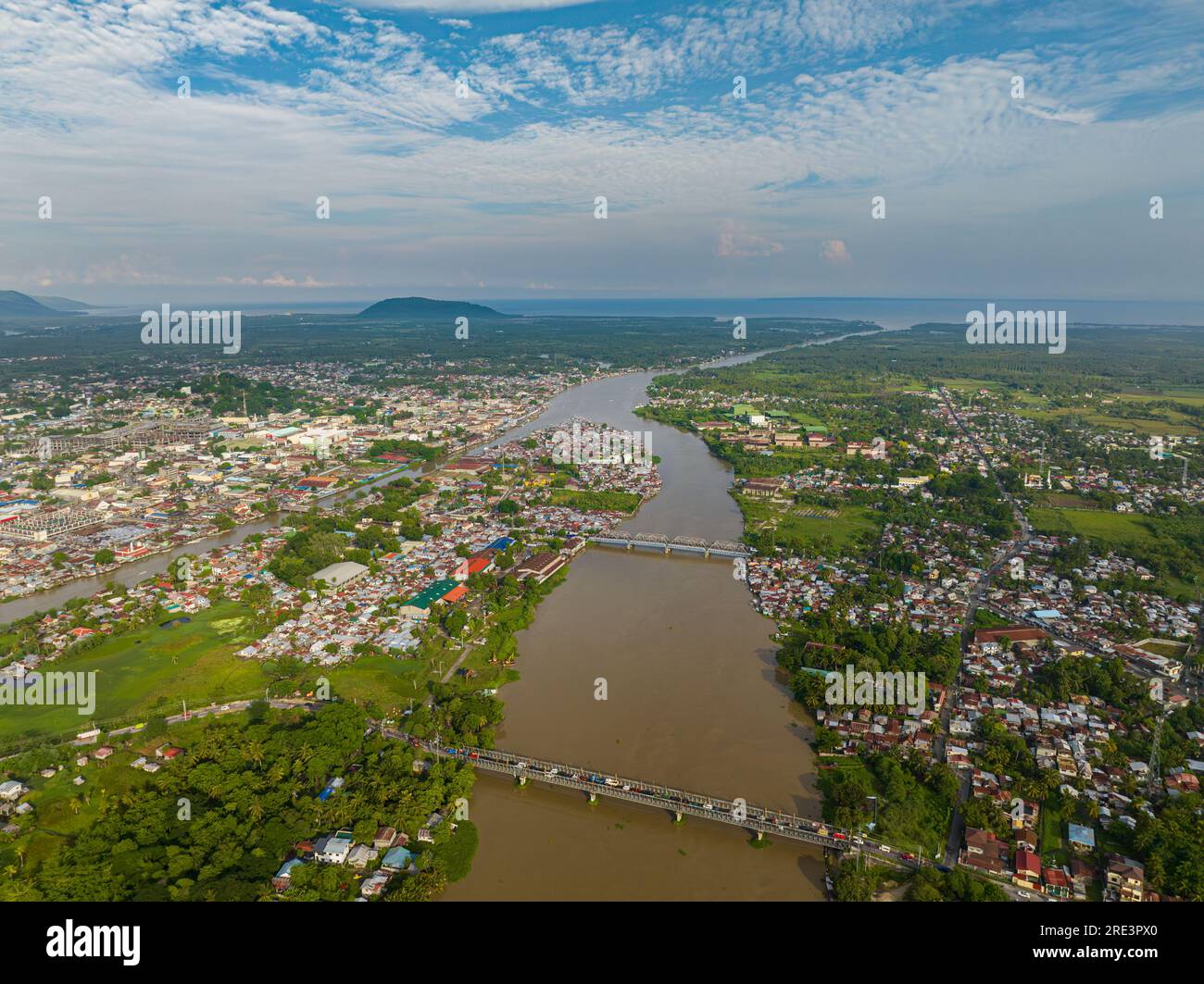 Cotabato City with river and bridge. Mindanao, Philippines. Cityscape ... Cotabato City with river and bridge. Mindanao, Philippines. Cityscape ...