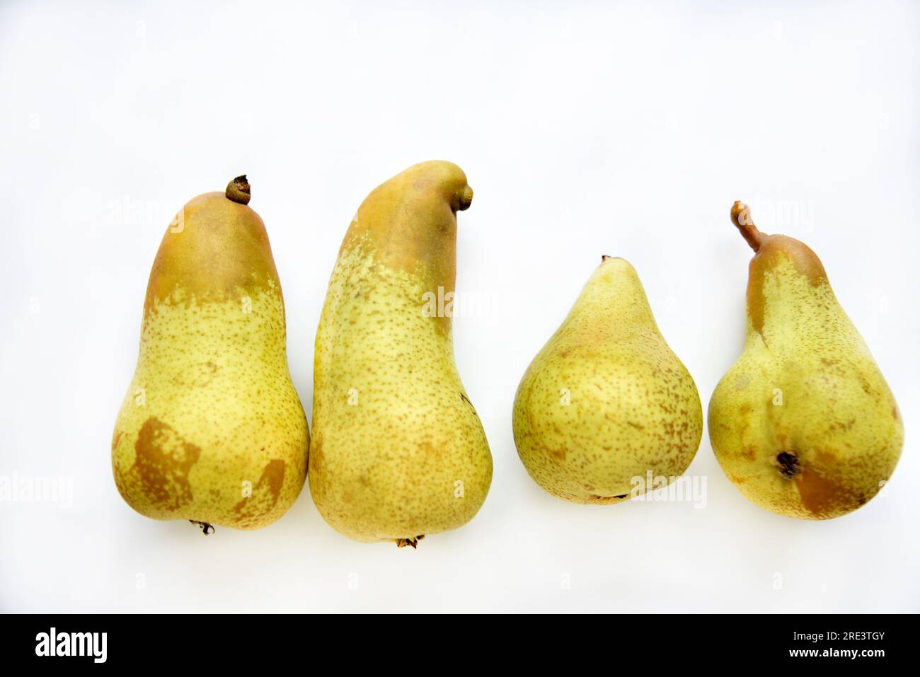 Fresh delicious yellow pears on a white background. Healthy eating ...