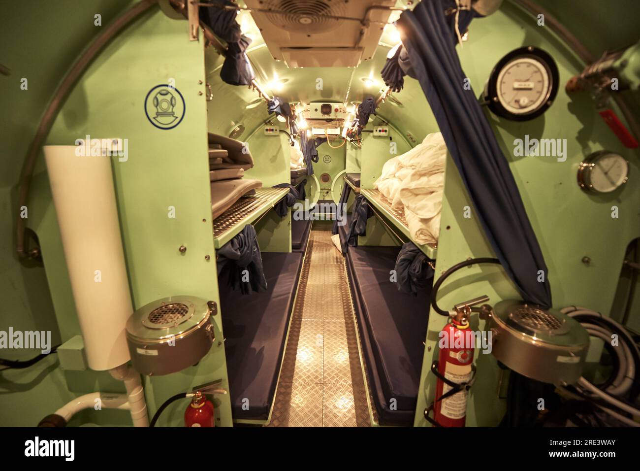 Inside the divers decompression chamber, bed room Stock Photo - Alamy