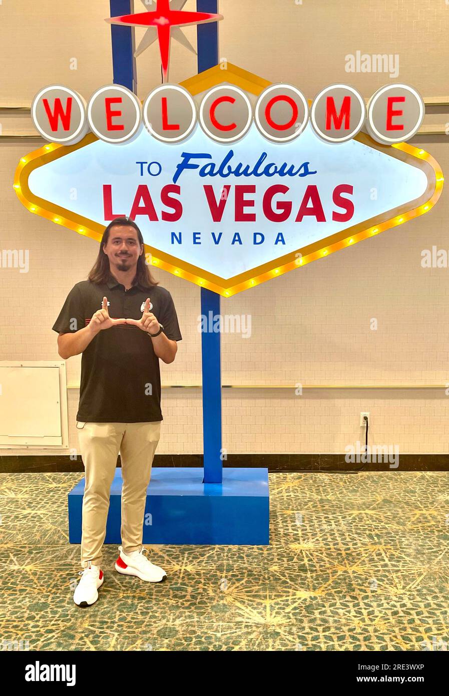 Utah quarterback Cameron Rising posing with the Las Vegas sign during ...