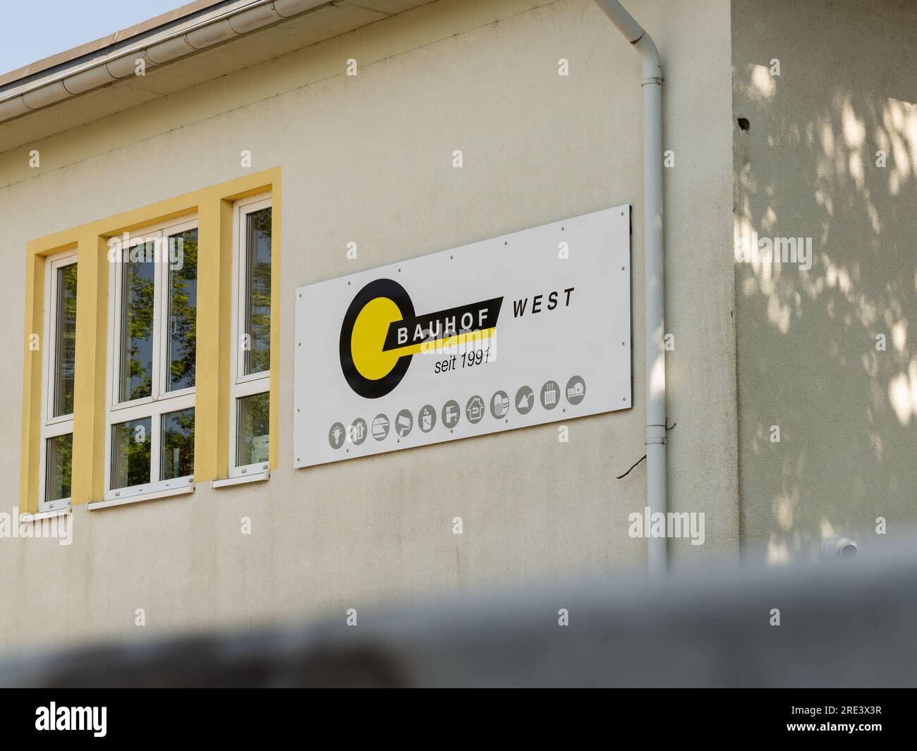 Bauhof West Service GmbH logo sign on a building exterior. The company ...