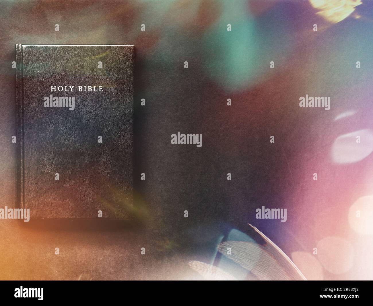 Holy Bible on the black background, vintage. Christian concept, copy ...