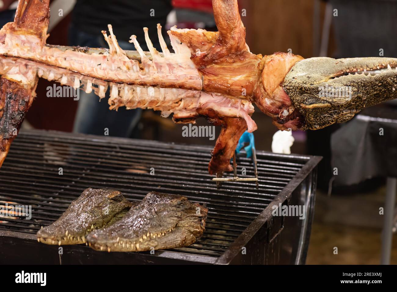 Grilled crocodile on the stove One of the specialty street food in the ...