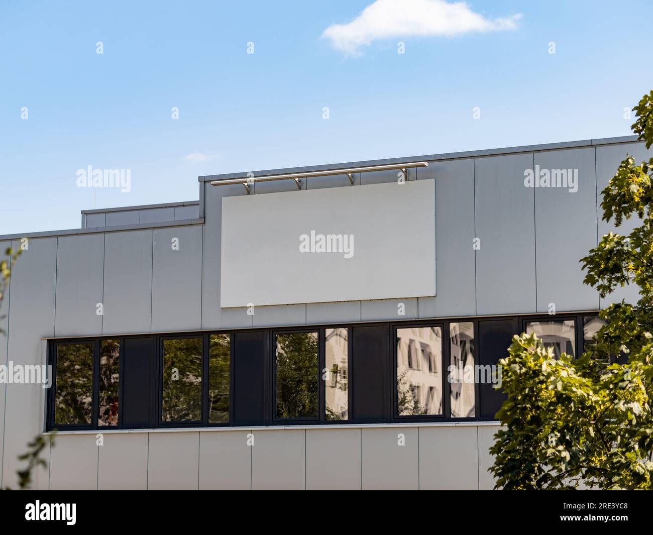 Empty company name boad on an industry building. Template for a logo on ...