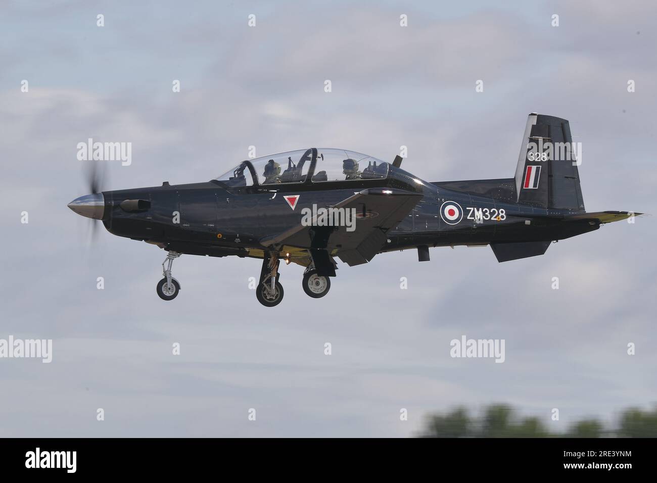 Fairford, UK. 12th July, 2023. RAF Raytheon T-6C Texan T1 ZM328 arrives ...