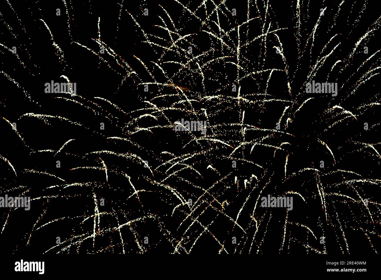 Close-up fireworks explode in the sky with motion blur on a black ...