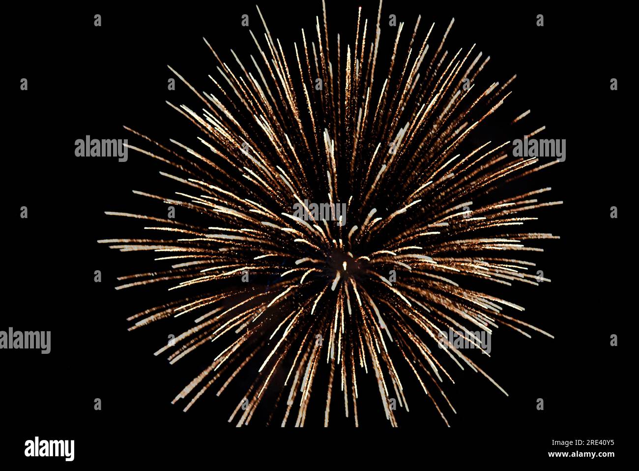 Close-up fireworks explode in the sky with motion blur on a black ...