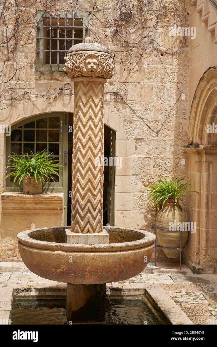 Secluded courtyard of a merchants house in the historic fortified city ...