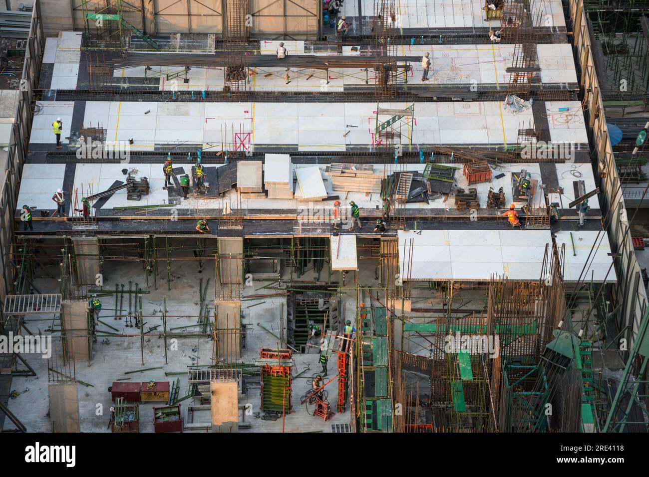 Construction workers build a big building Stock Photo - Alamy
