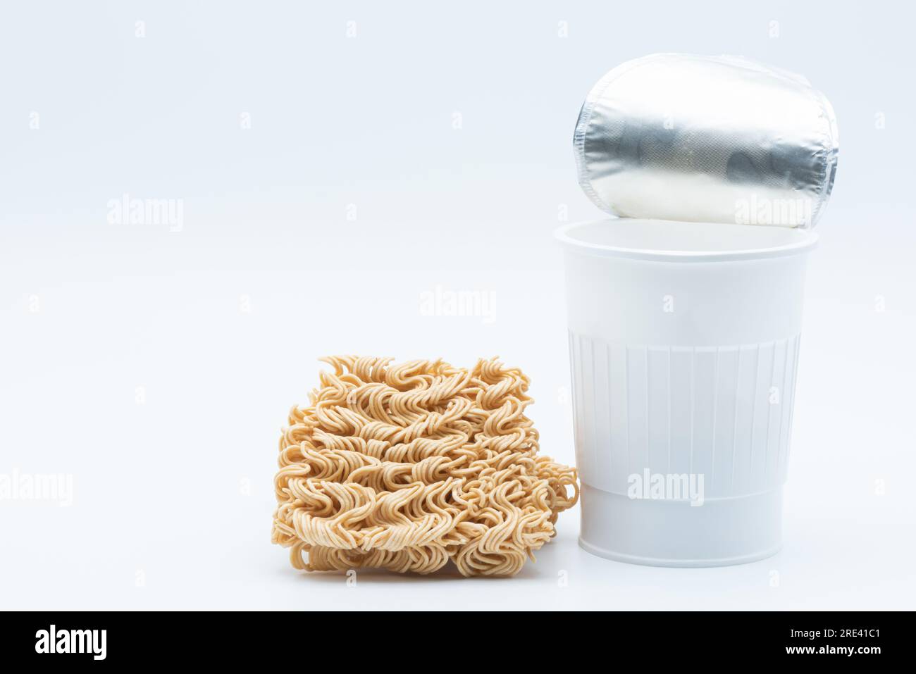 Instant noodle with plastic cup on a white backgroung Stock Photo - Alamy