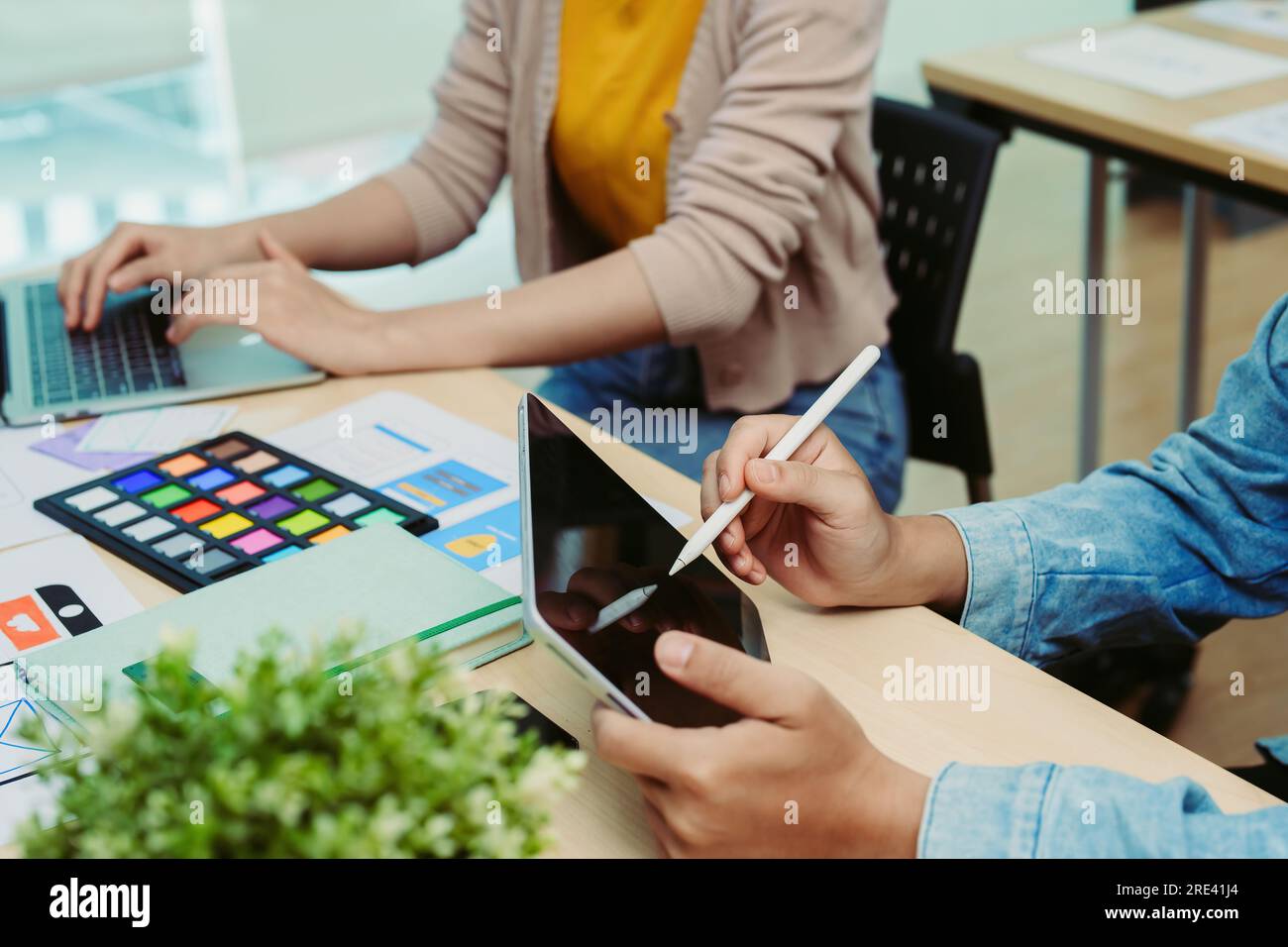 Group of asian creative team programing designers participate in all ...