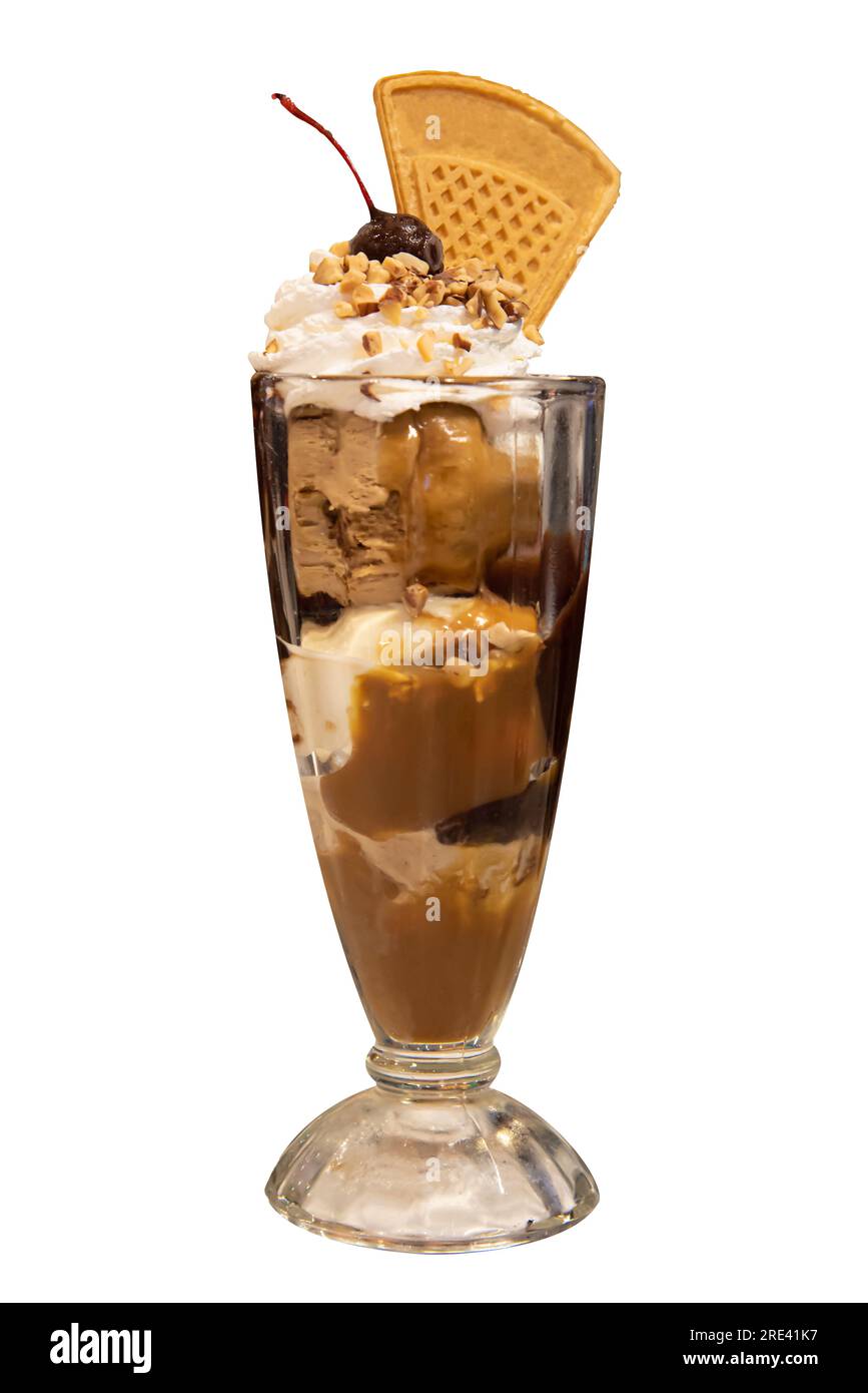 Ice cream parfait sundae in glasses with whip cream and wafer on top ...