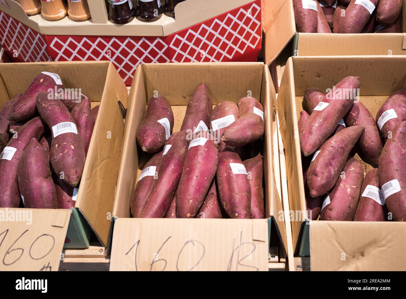 Sweet potato are on sale in the supermarket Stock Photo - Alamy