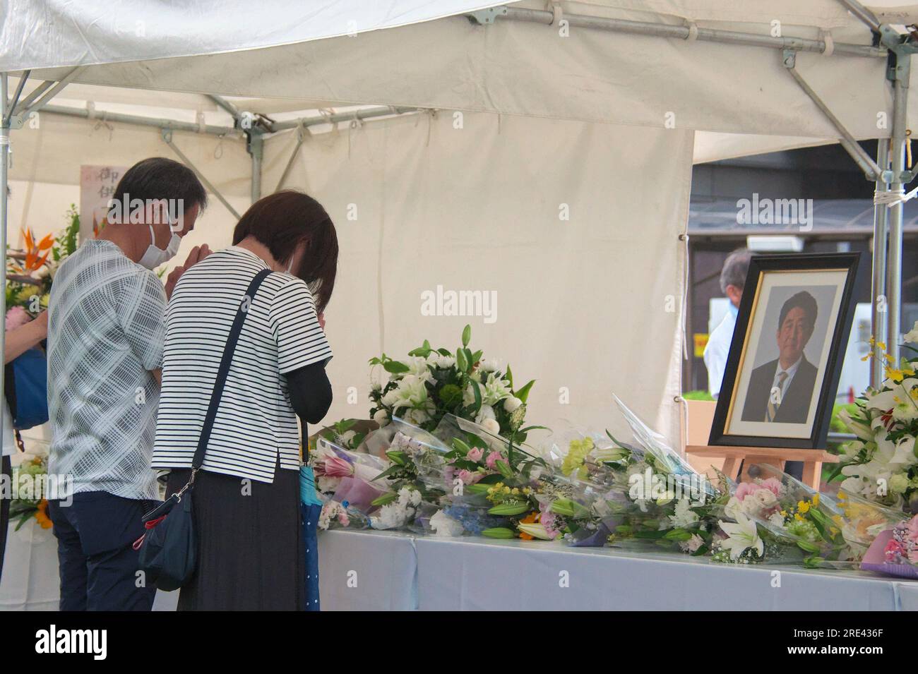 Peoples offer flowers and pray during the 1st anniversary of late ...