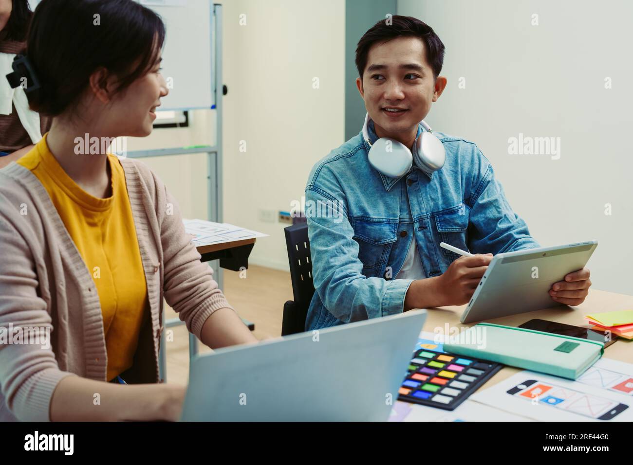 Group of asian creative team programing designers participate in all ...