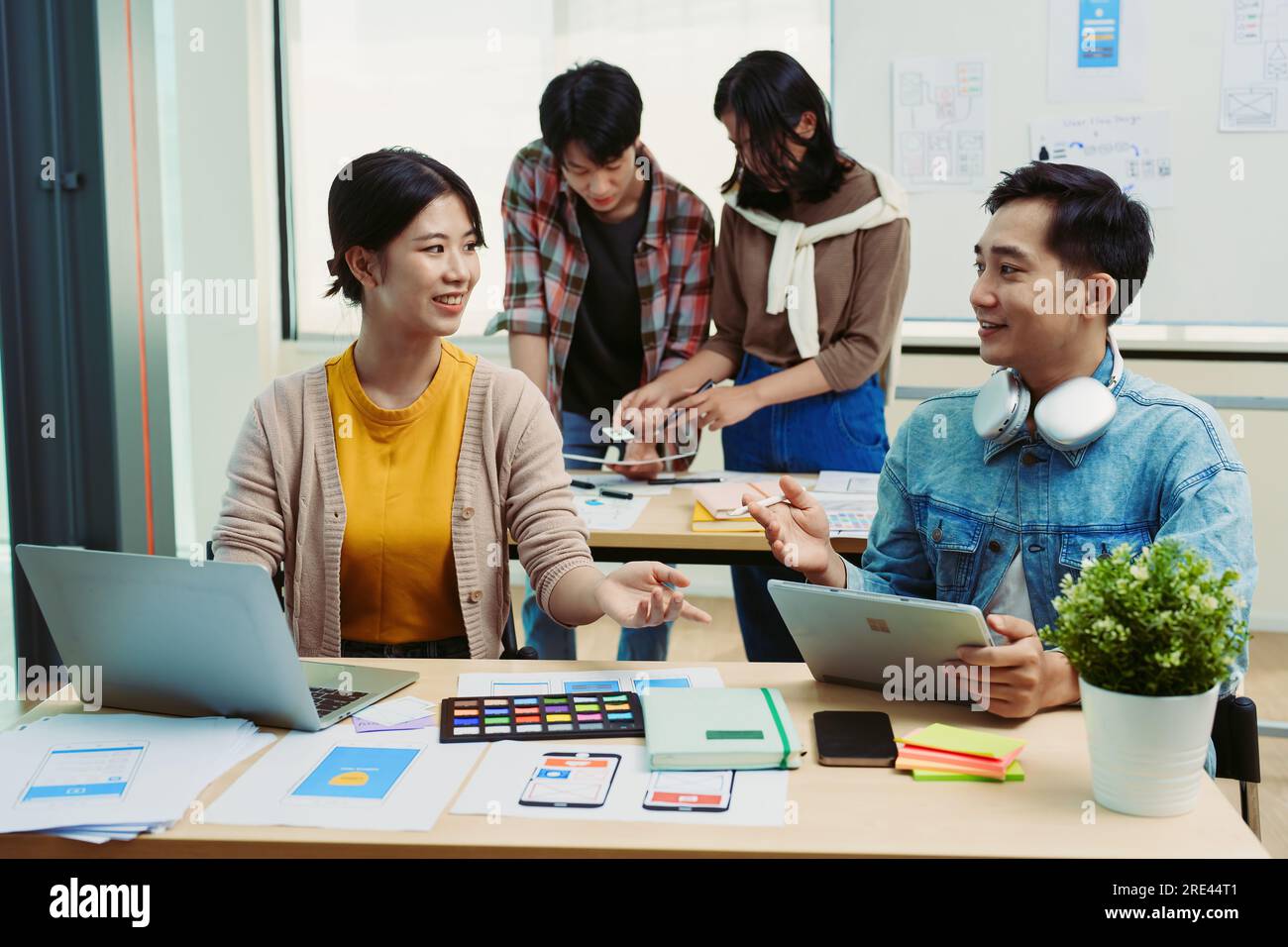 Group of asian creative team programing designers participate in all ...